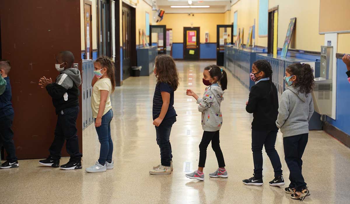 Temperature checks, hand sanitizer, and airplane arms greet Detroit ...